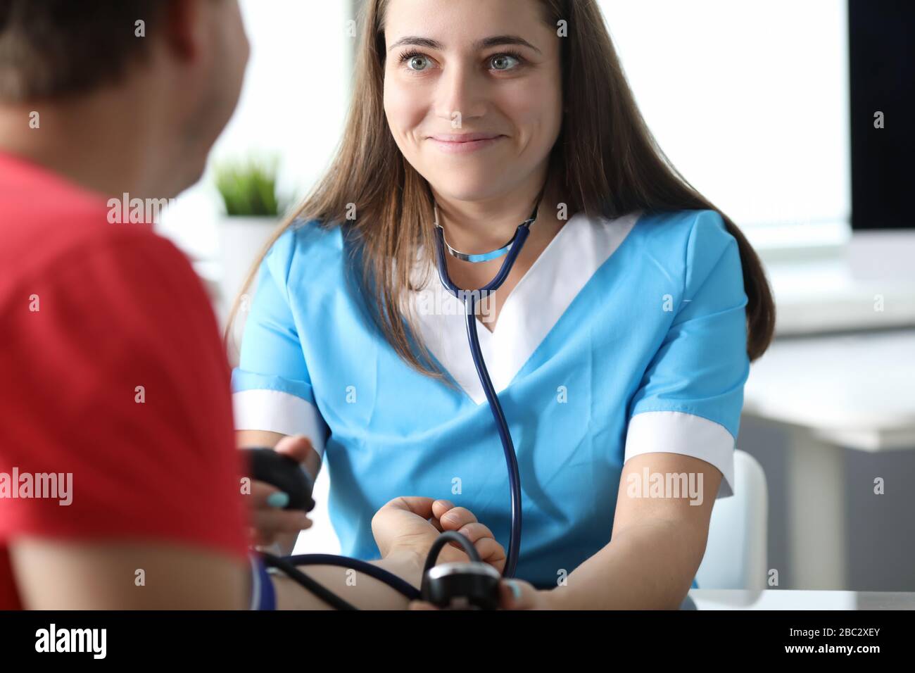 Happy lovely nurse at work Stock Photo - Alamy