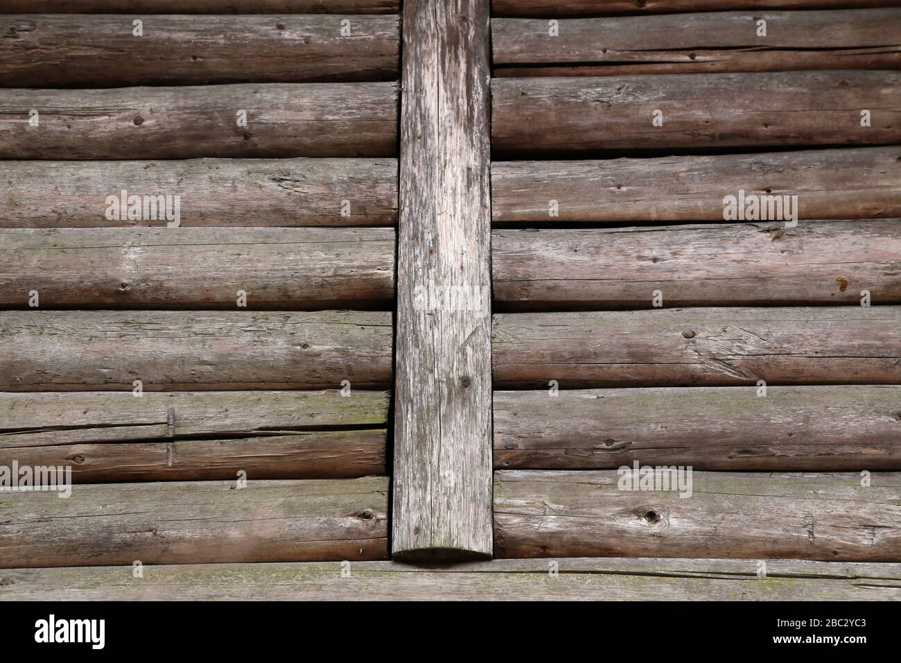 Wooden wall of a house made of thick logs Stock Photo - Alamy