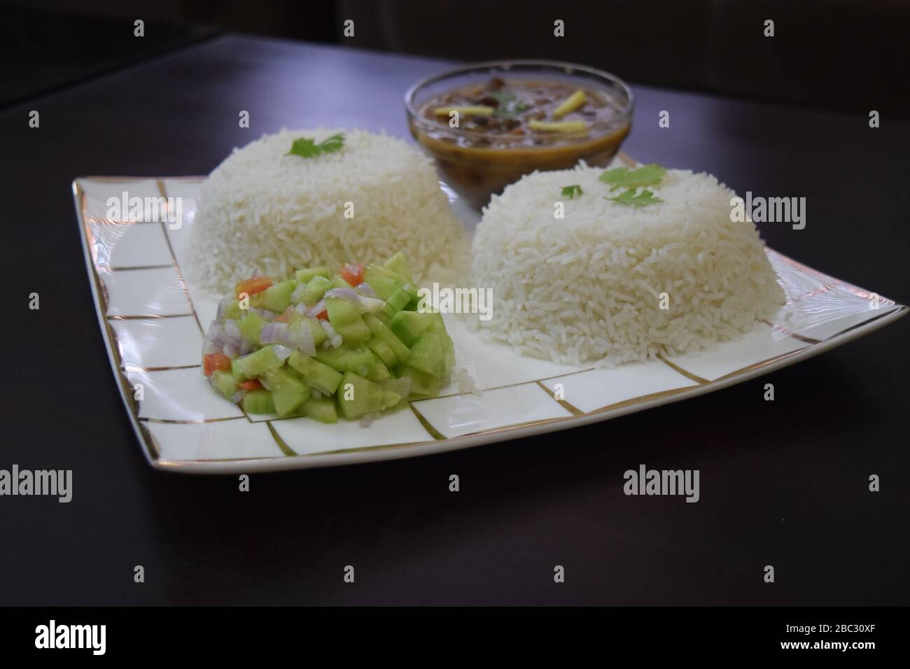 How to boil rice hi-res stock photography and images - Alamy