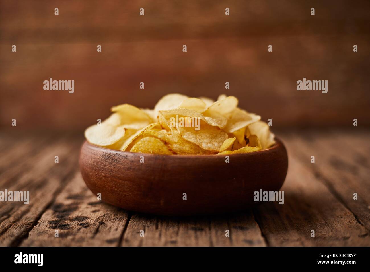 Crunchy delicious potato chips for a tasty snack break Stock Photo - Alamy