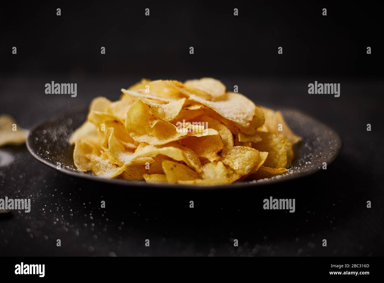 Crunchy delicious potato chips for a tasty snack break Stock Photo - Alamy