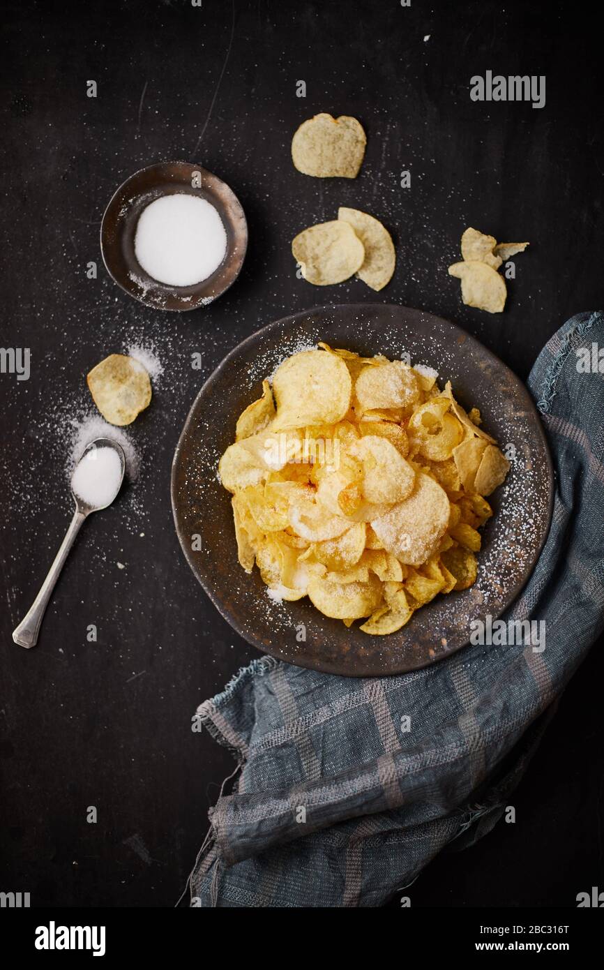 Crunchy delicious potato chips for a tasty snack break Stock Photo - Alamy
