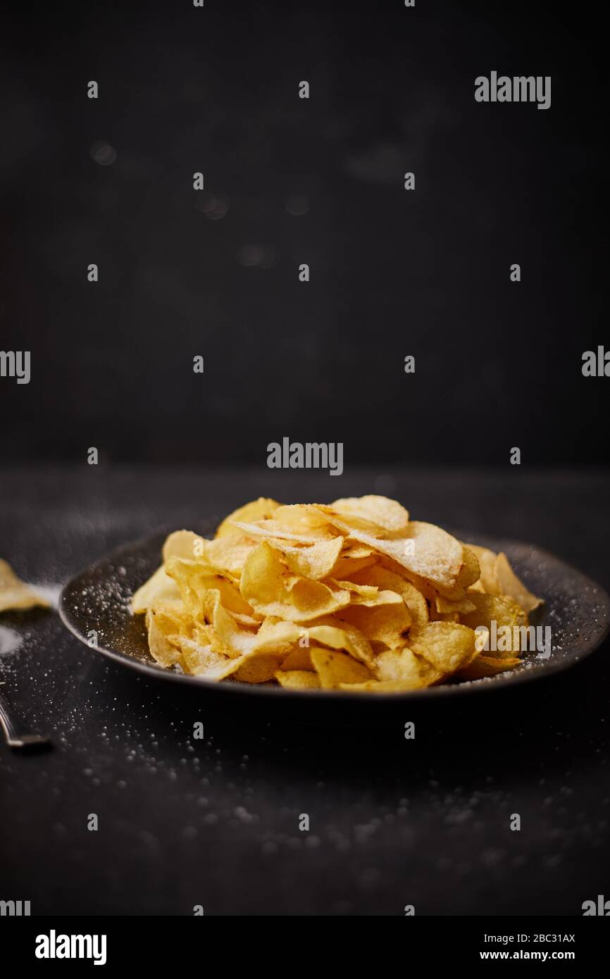 Crunchy delicious potato chips for a tasty snack break Stock Photo - Alamy
