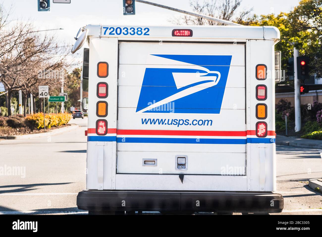Mar 30, 2020 Santa Clara / CA / USA - Back view of USPS vehicle ...