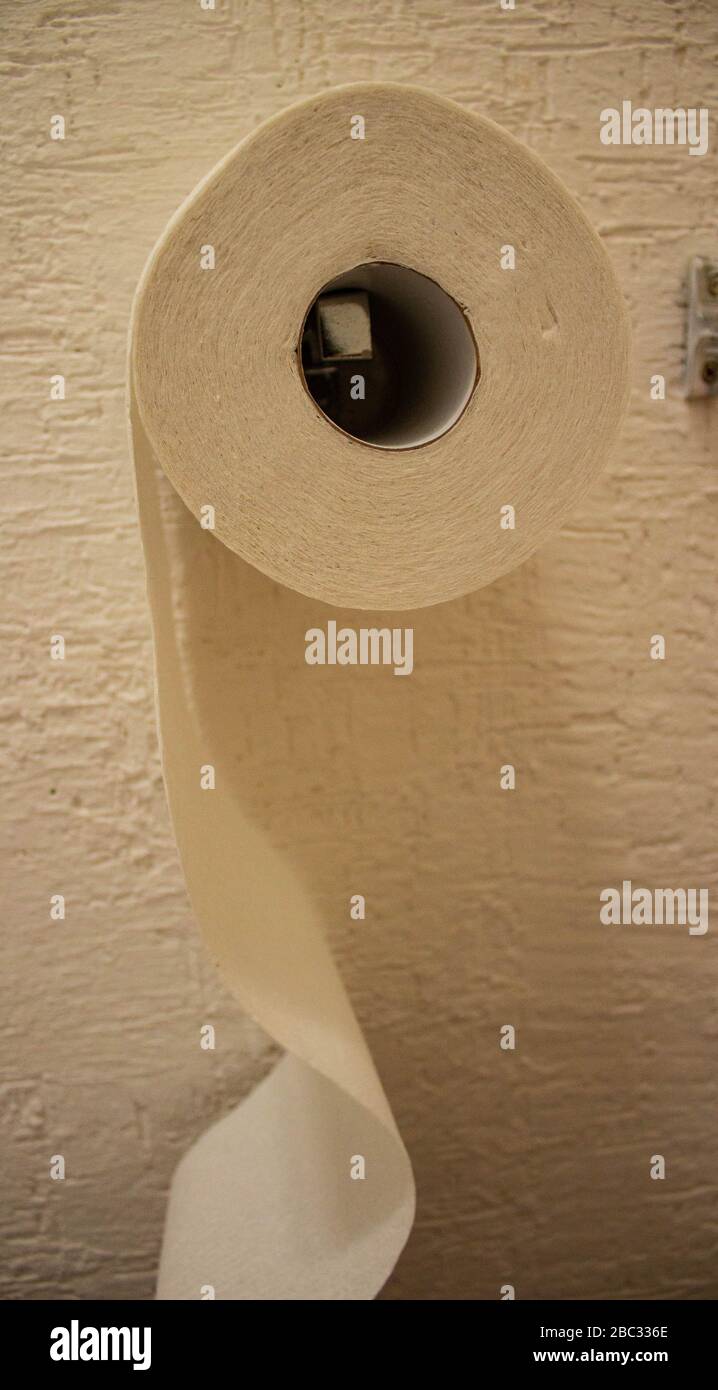toilet paper in bathroom Stock Photo - Alamy
