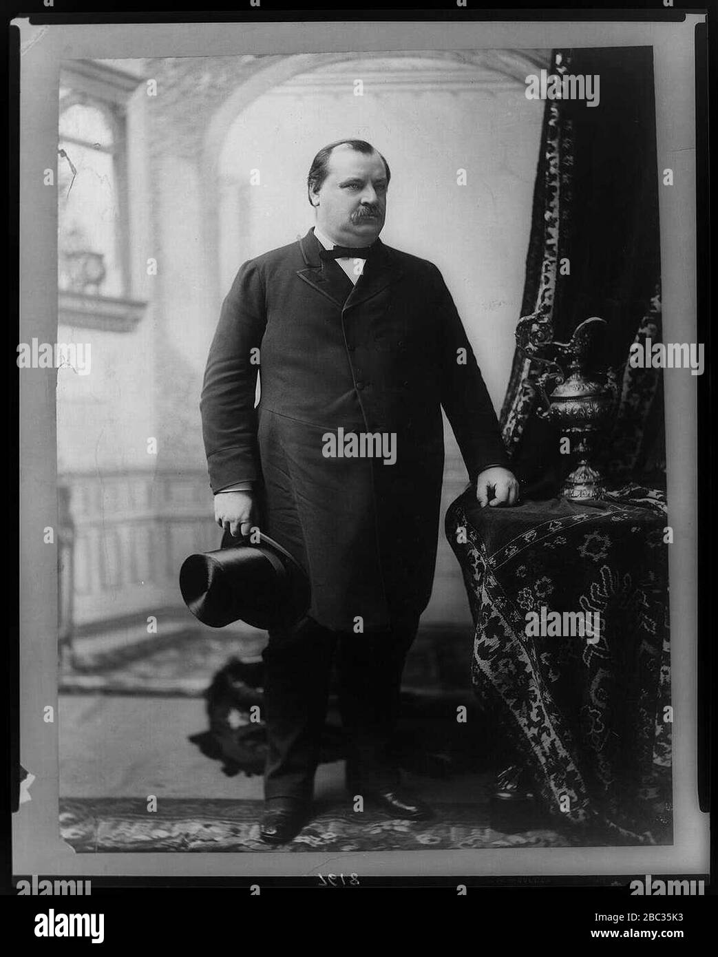 Grover Cleveland, full-length portrait, standing, facing right, holding ...