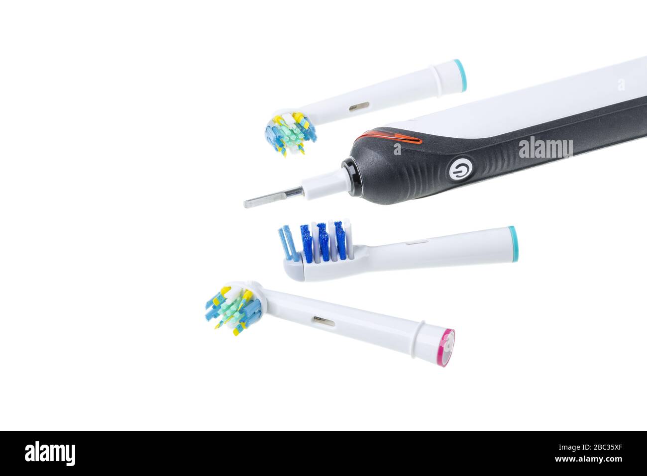 Three kinds of head and toothbrush close up view isolated. Health care ...