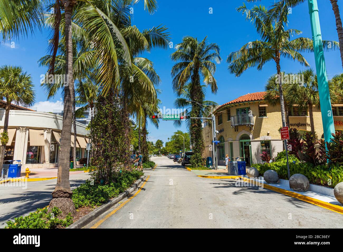 Landscape view of street of Miami. Colorful buildings on blue sky with ...