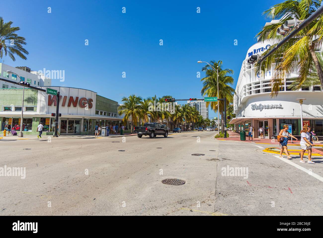 Beautiful landscape view of street of Miami Beach. White buildings and ...