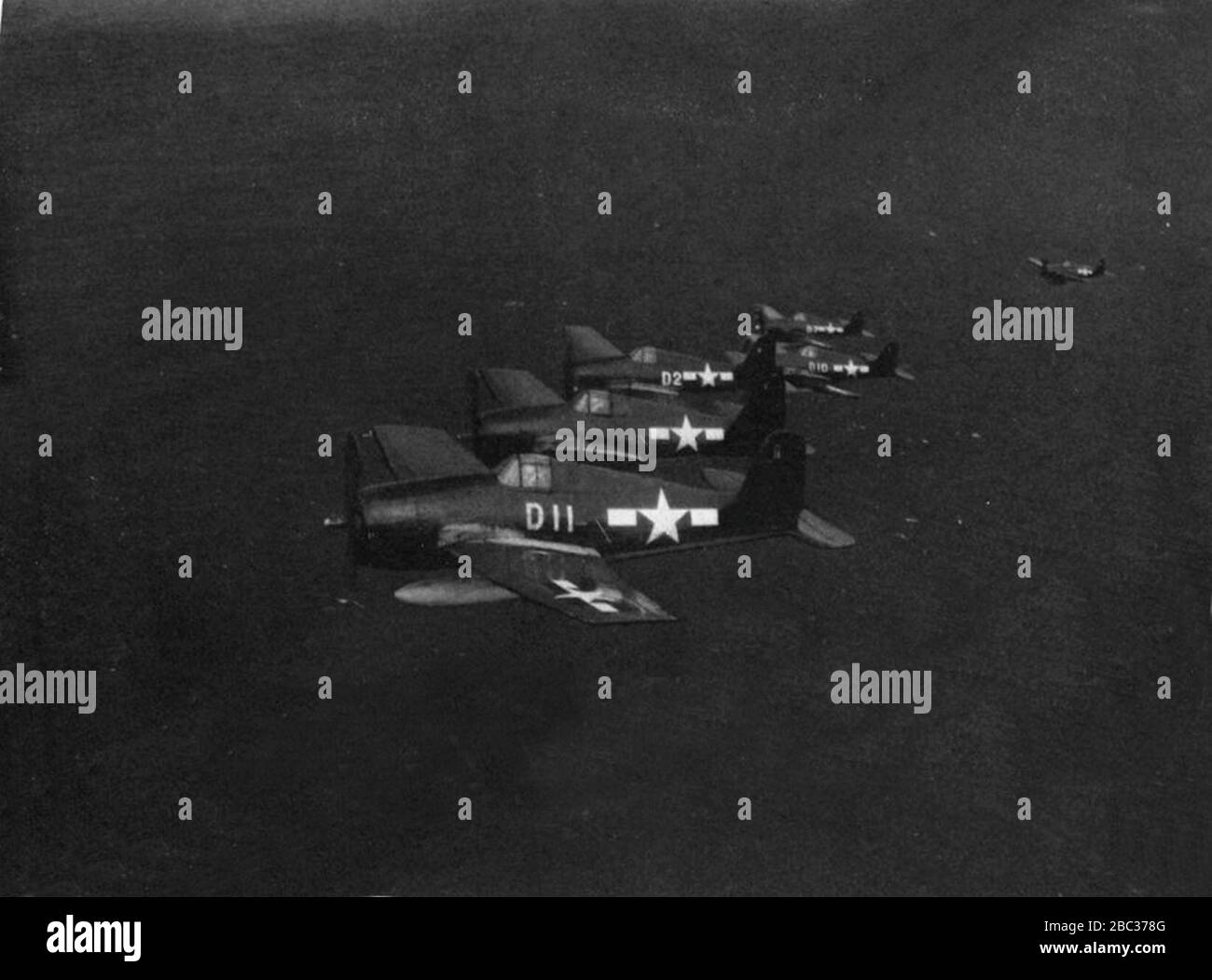 Grumman F6F-5 Hellcats of VF-60 in flight, circa in 1944 Stock Photo ...