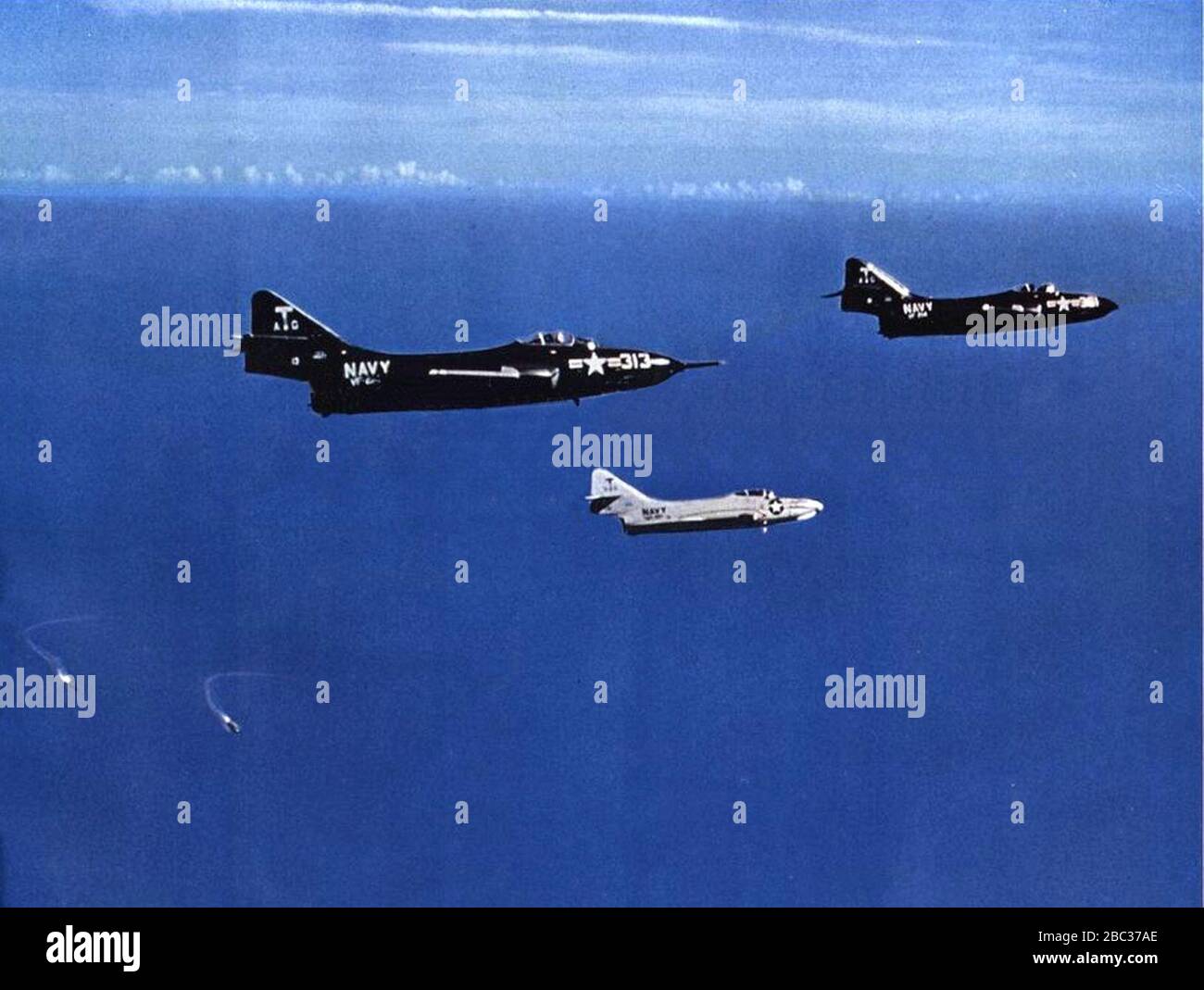 Grumman F9F-8 Cougars of VF-214 in flight, in 1956 Stock Photo - Alamy