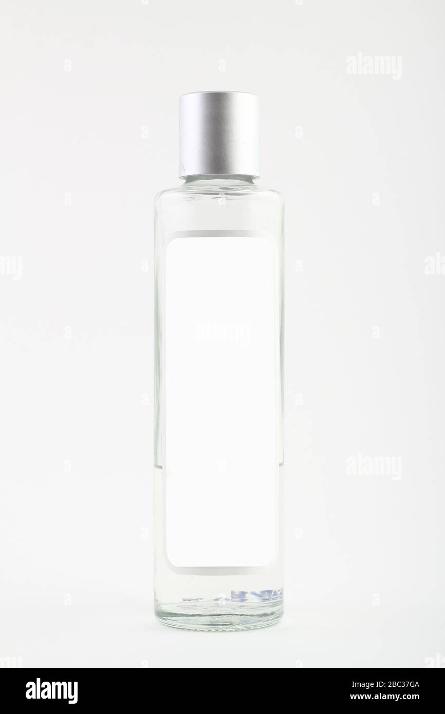 Bottle of cologne isolated over a white background Stock Photo - Alamy