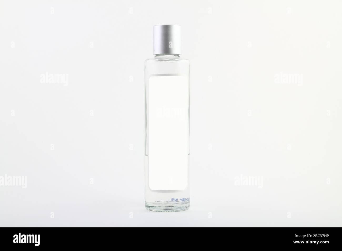 Bottle of cologne isolated over a white background Stock Photo - Alamy