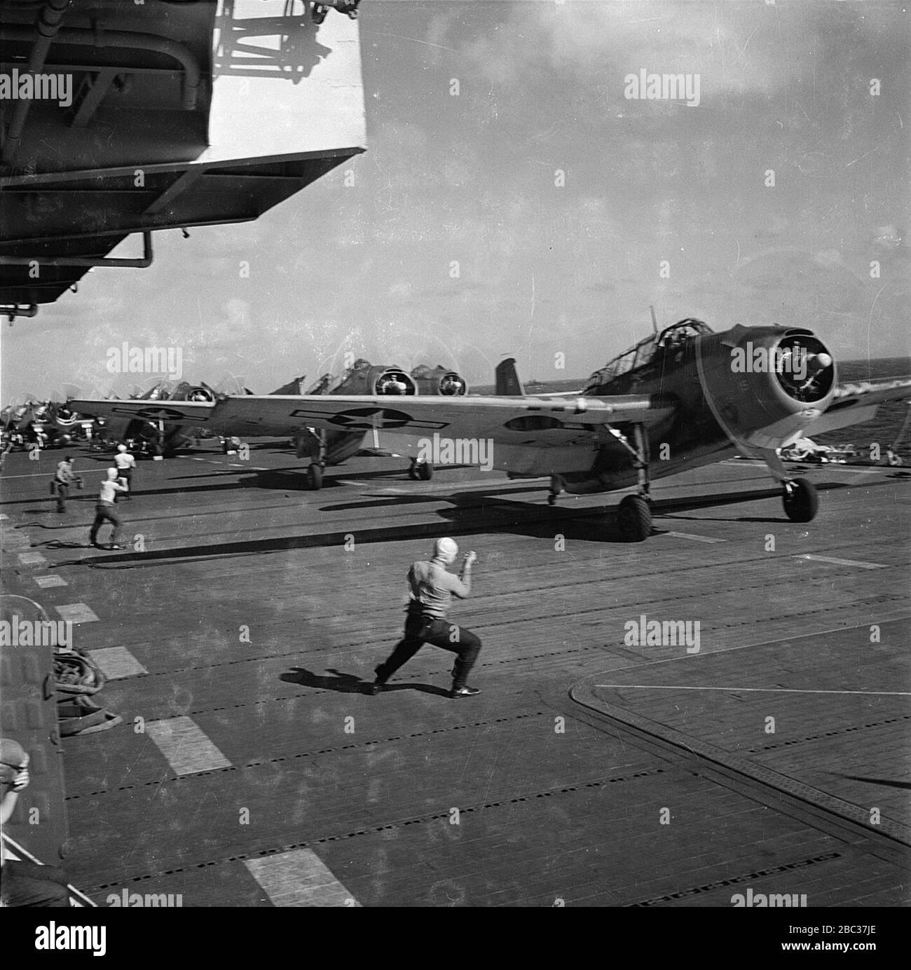Grumman TBF Avengers of VT-28 aboard USS Monterey (CVL-26) in June 1944 ...