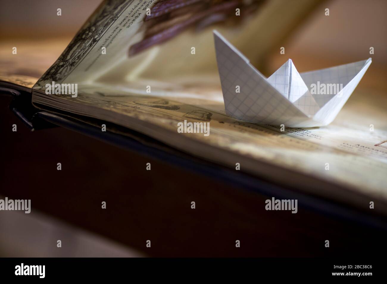 Origami boat, book hi-res stock photography and images - Alamy
