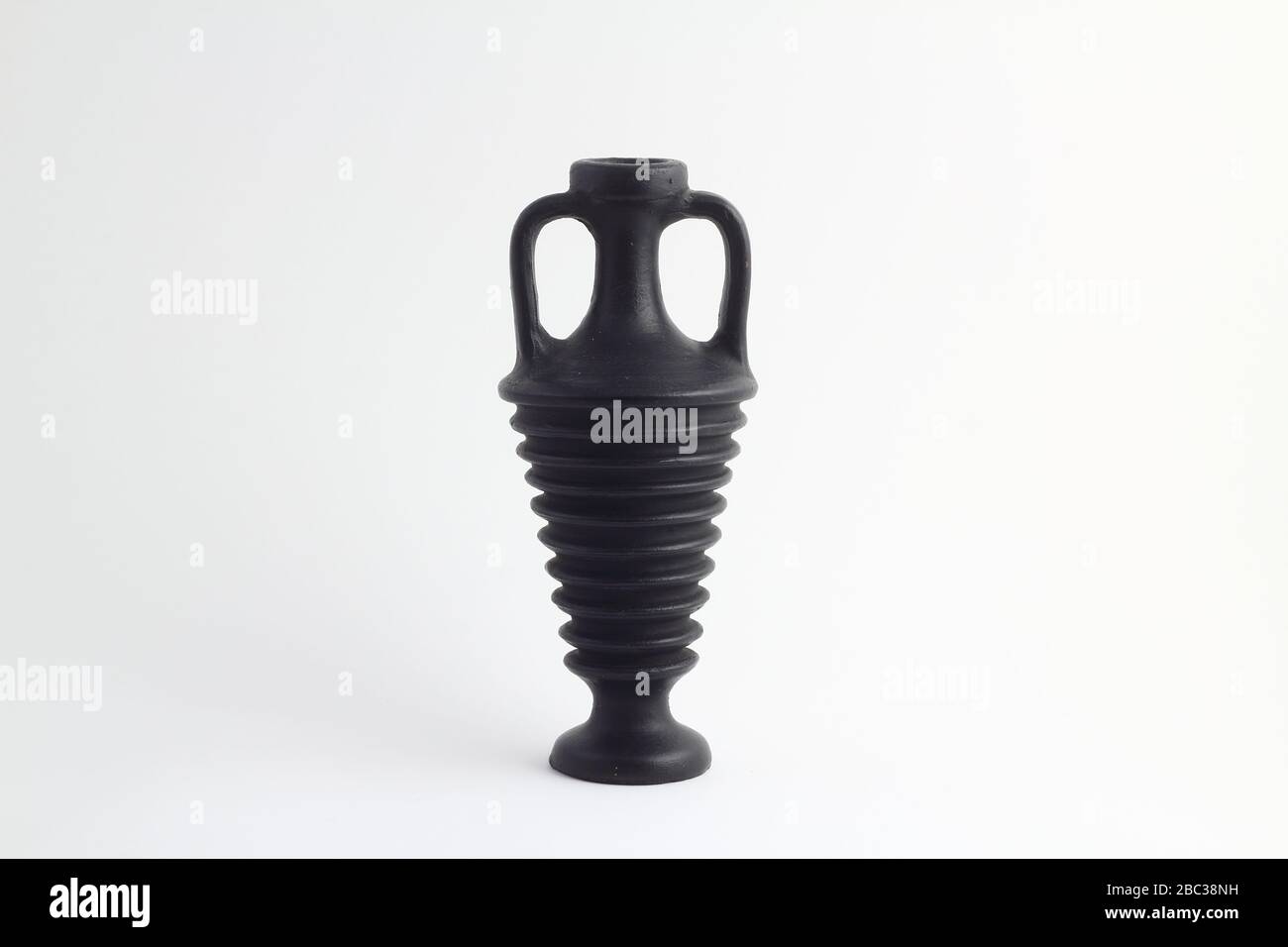 clay black jug isolated on a white background. vintage empty jug front ...