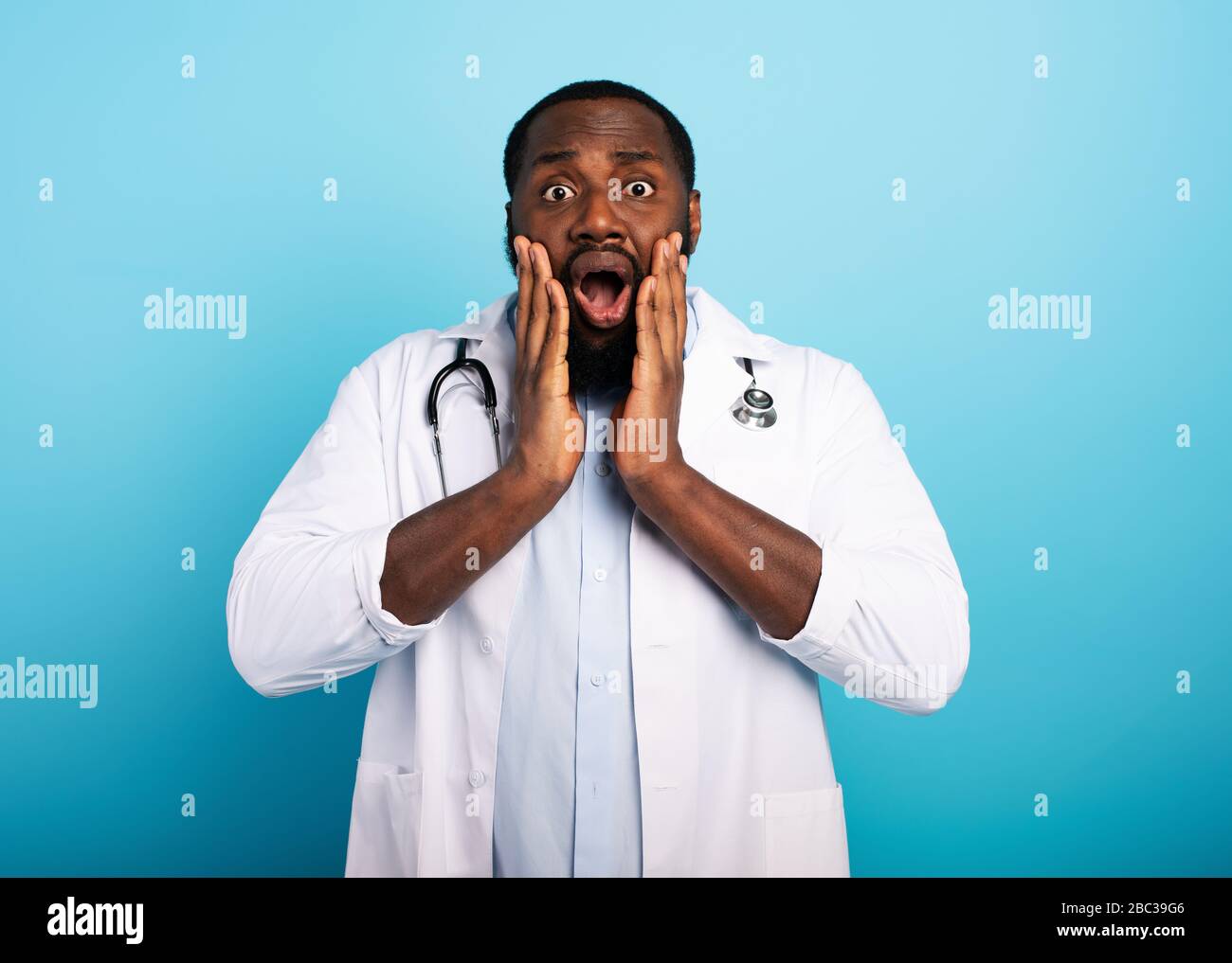 Scared doctor face expression due to coronavirus pandemic. Blue ...