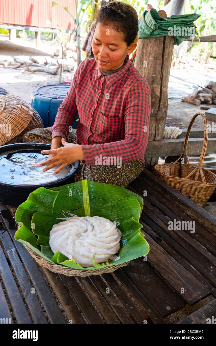 A woman packages rice noodles. Angkor Wat, Siem Reap, Cambodia Stock ...