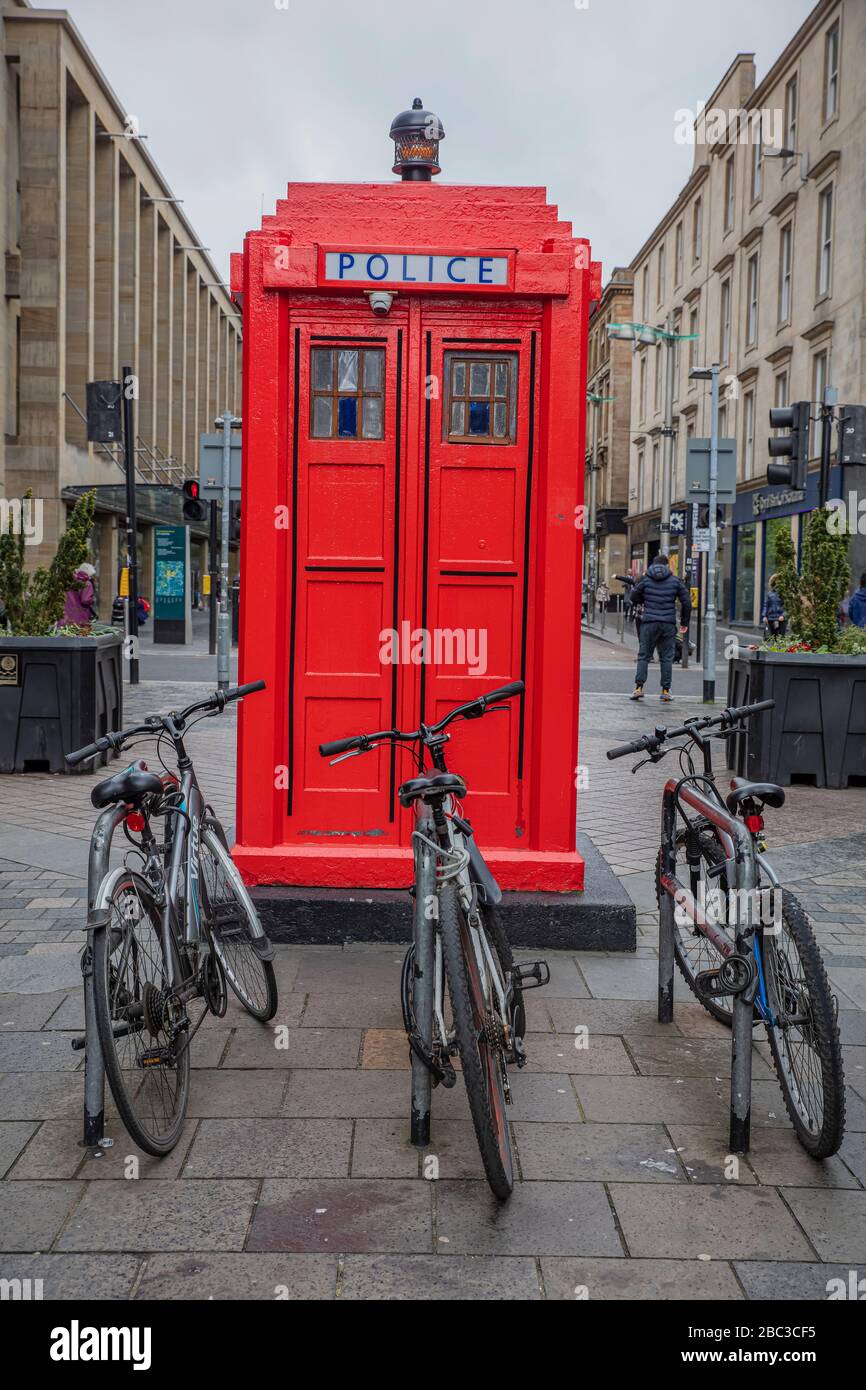 Red Tardis Police Box with 3 Bicycles in Glasgow City Centre Stock ...