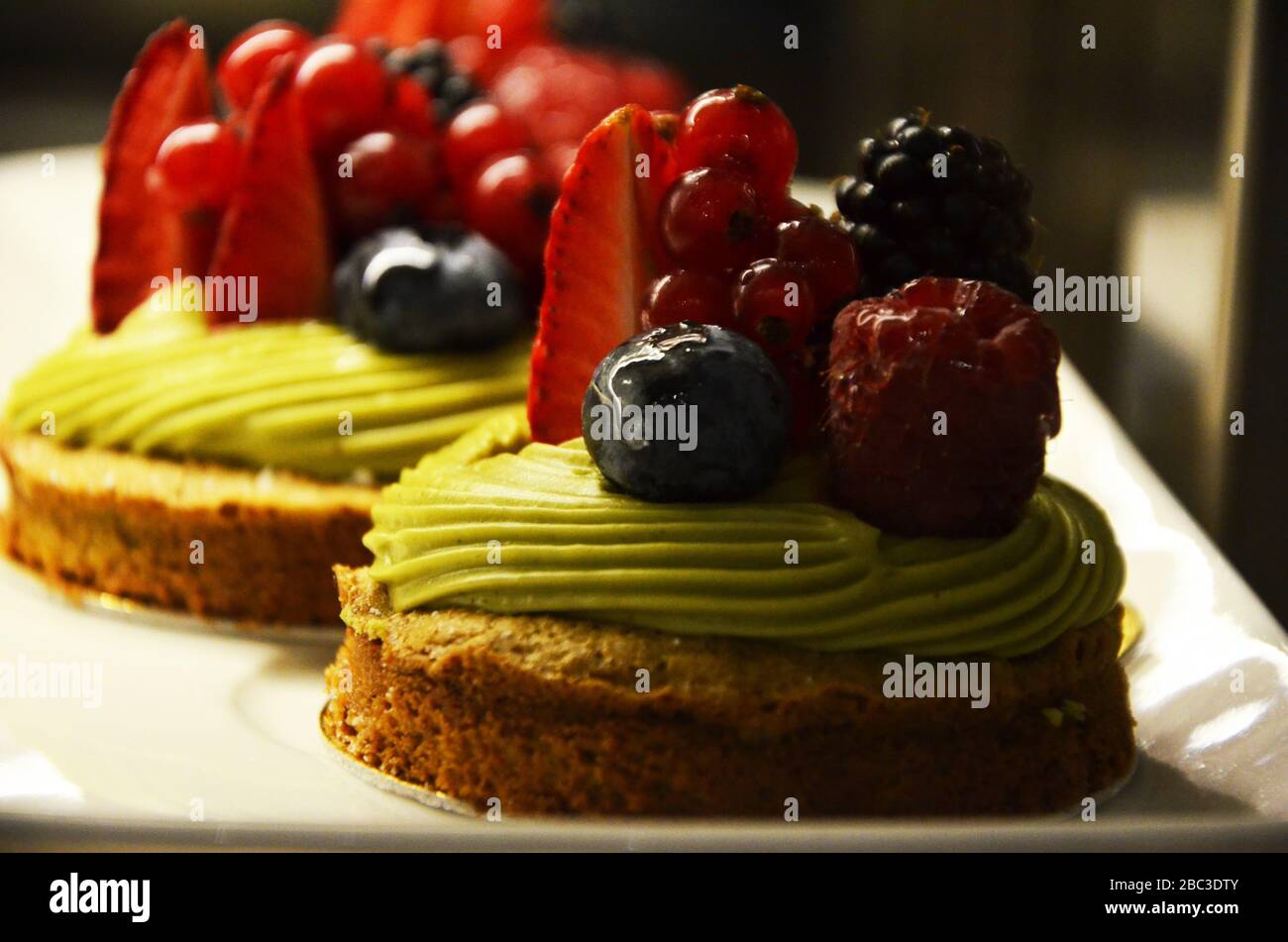 Pistachio cake fresh raspberries hi-res stock photography and images ...