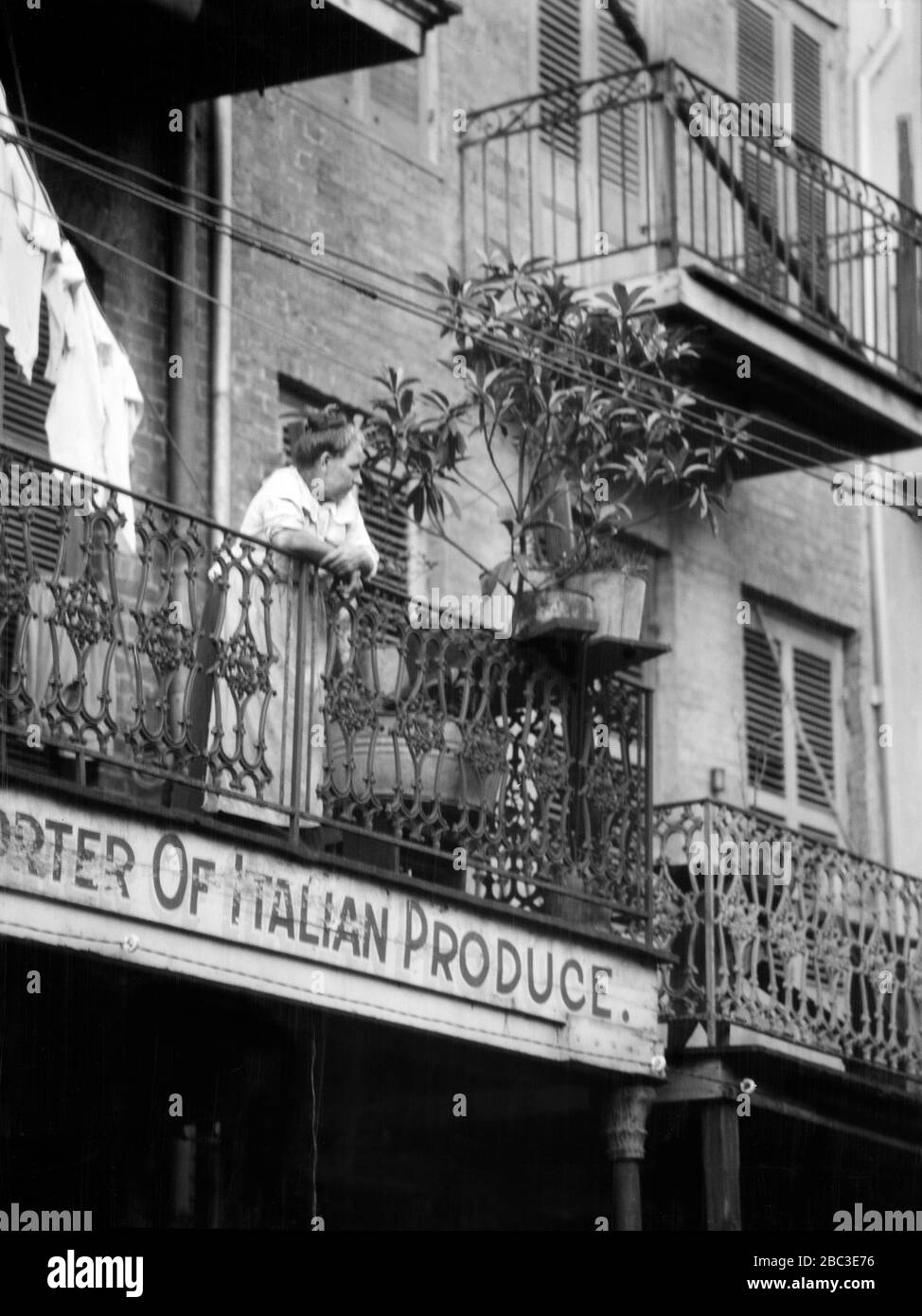 Woman leaning on Balcony, New Orleans, Louisiana, USA, Arnold Genthe ...