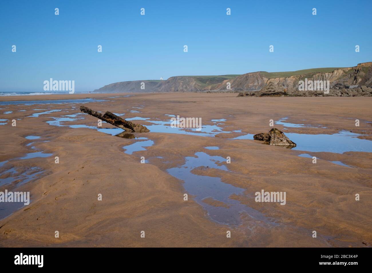Dangerous pieces of wreckage sticking up from the beach will be hidden ...