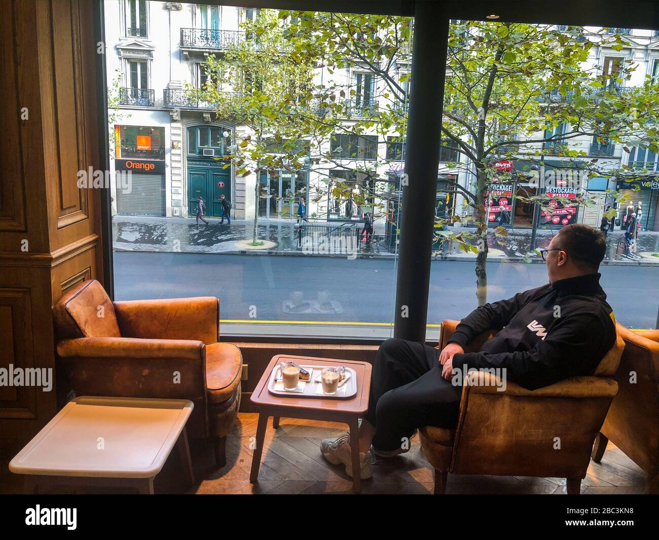 Paris, France, Chinese Tourist Relaxing Inside Window, French Cafe in ...