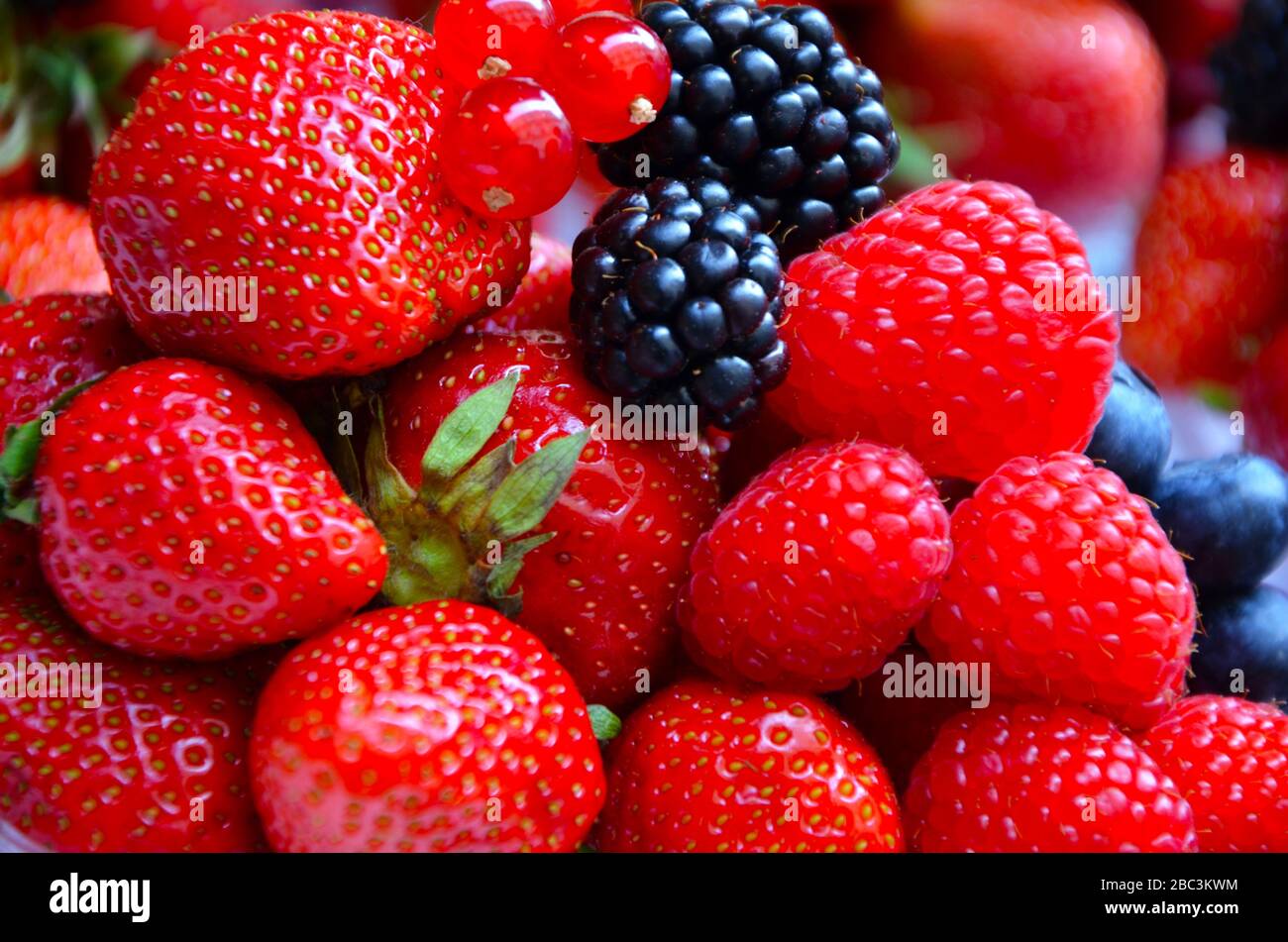fresh berry fruits close up view Stock Photo - Alamy