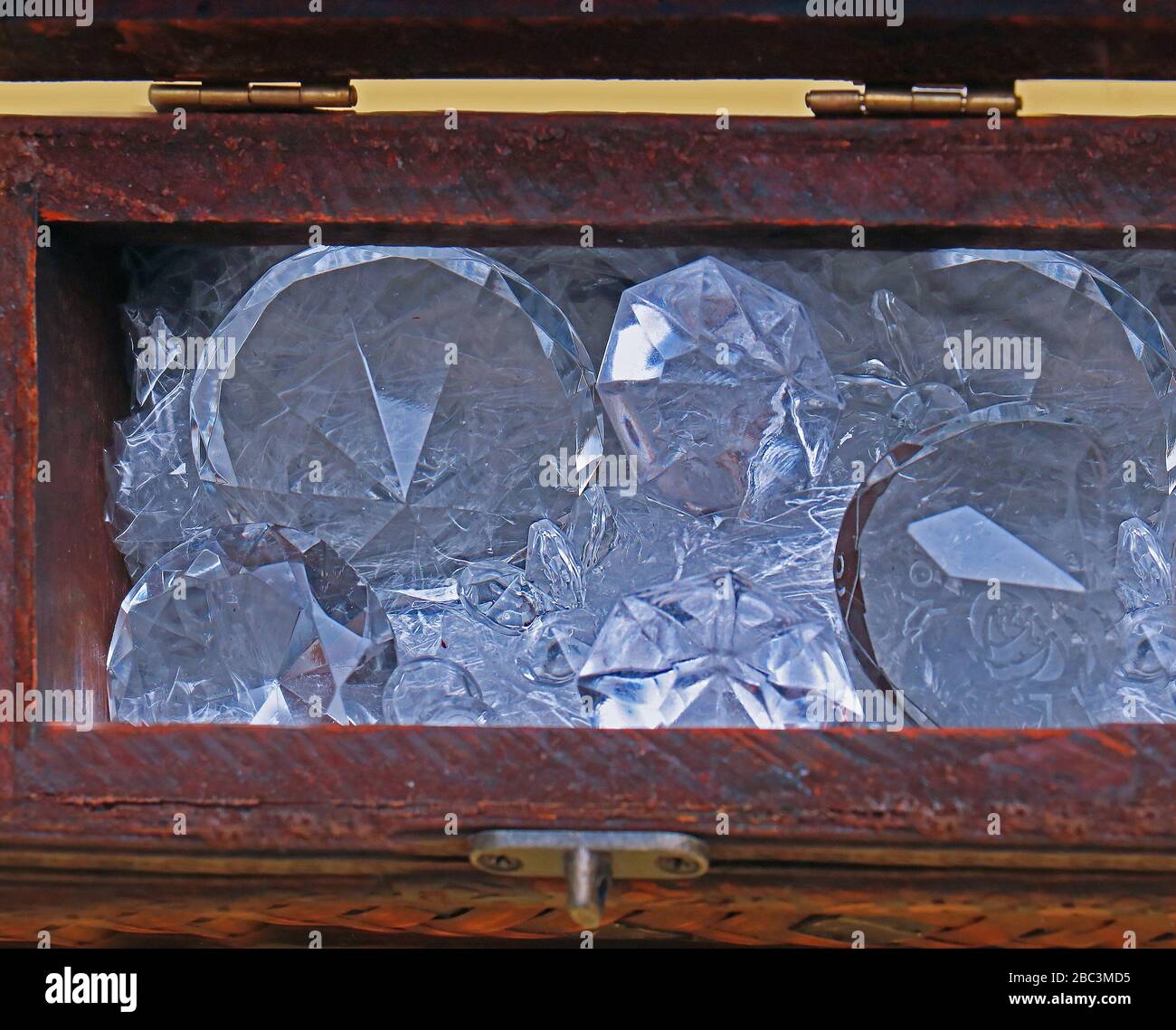 Pile of luxury crystal diamonds hidden inside wooden chest Stock Photo ...