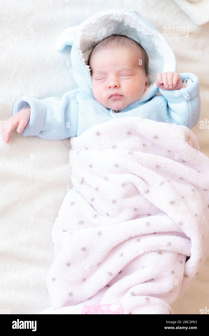 Newborn baby close-up, place for text. Newborn sleeping on his back in ...