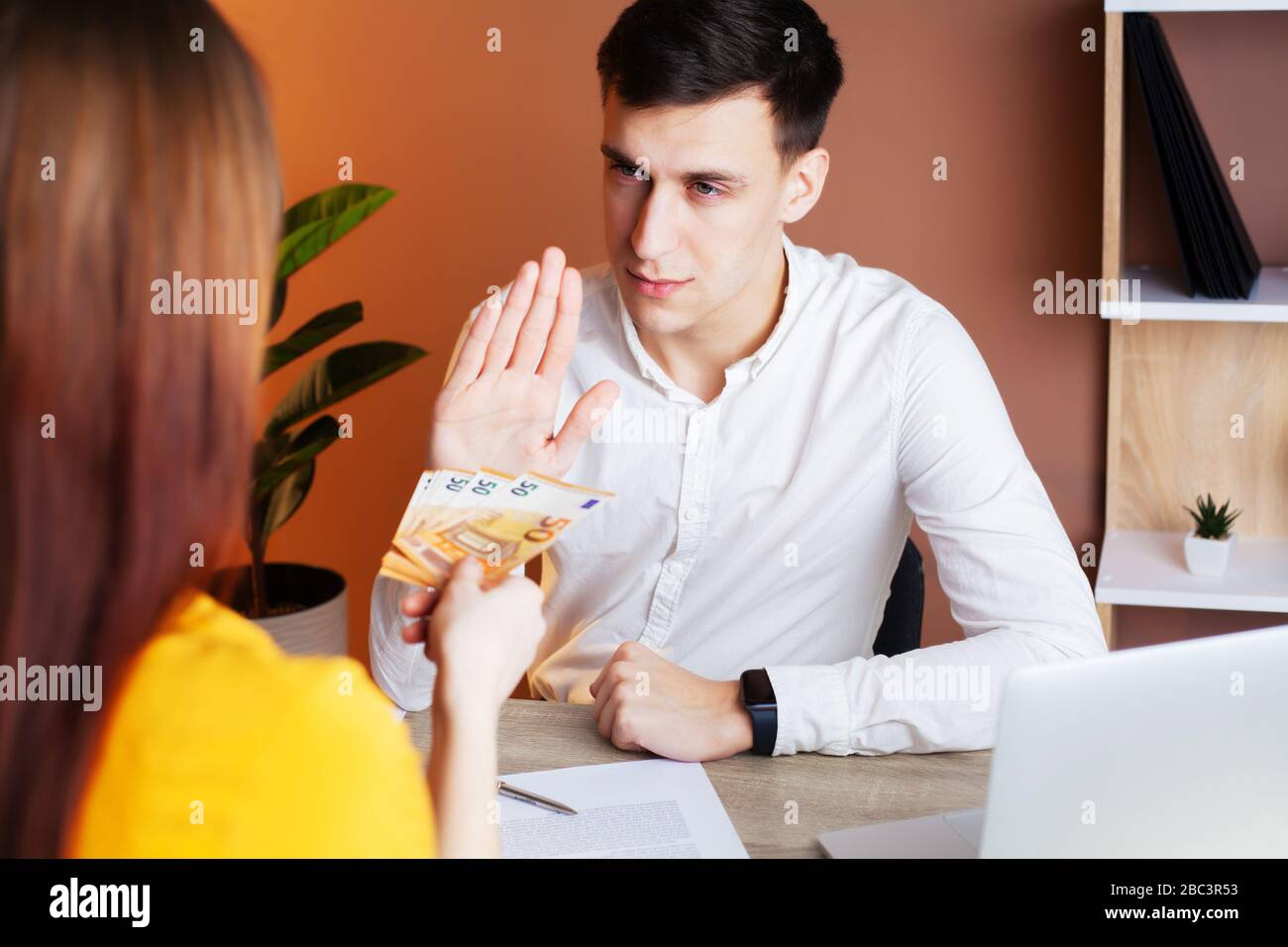 The employee offered a bribe for a favorable contract signing Stock ...