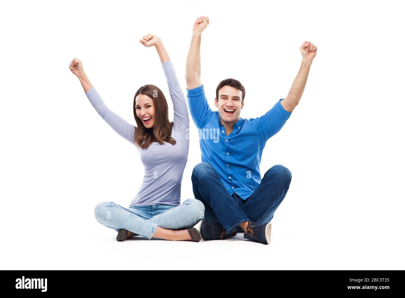 Young couple over white background Stock Photo - Alamy