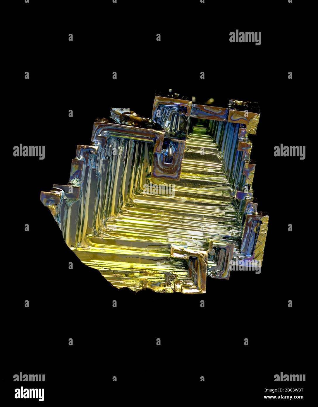Bismuth crystal on black background Stock Photo - Alamy