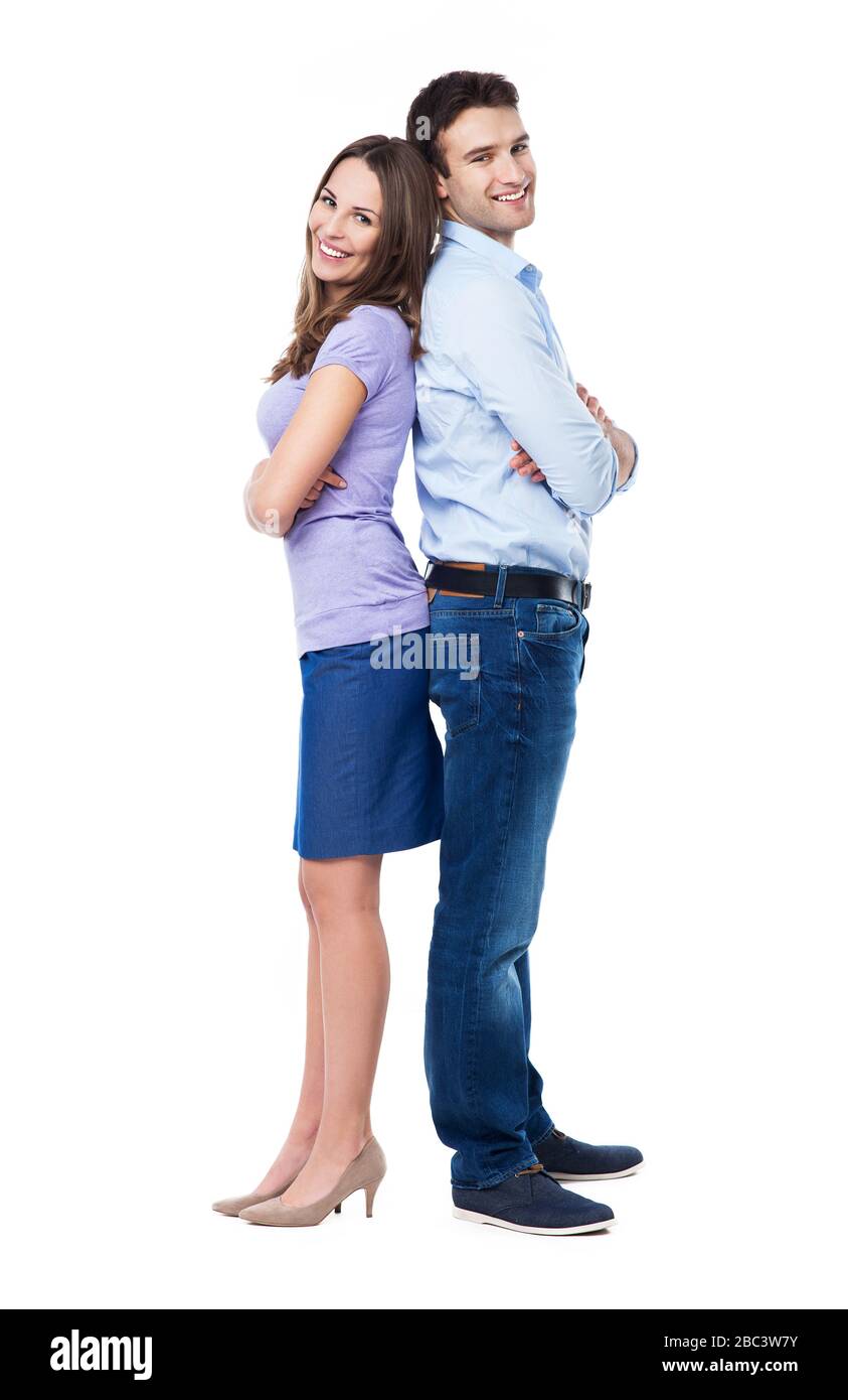 Young couple over white background Stock Photo - Alamy