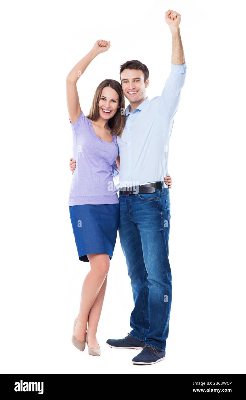 Young couple over white background Stock Photo - Alamy