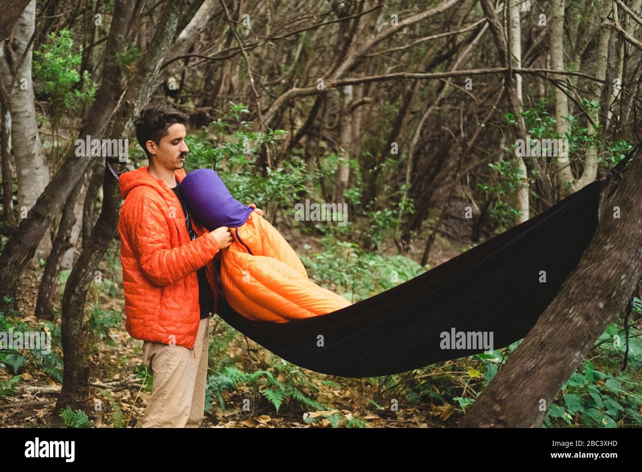 Man sleeping in the forest hi-res stock photography and images - Alamy