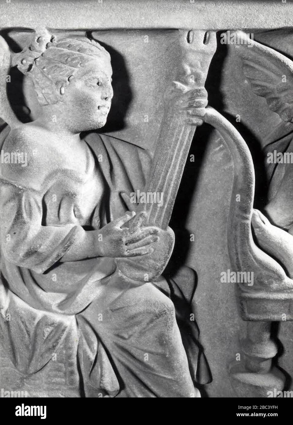 Guitar-type instrument depicted on an ancient Roman sarcophagus in ...