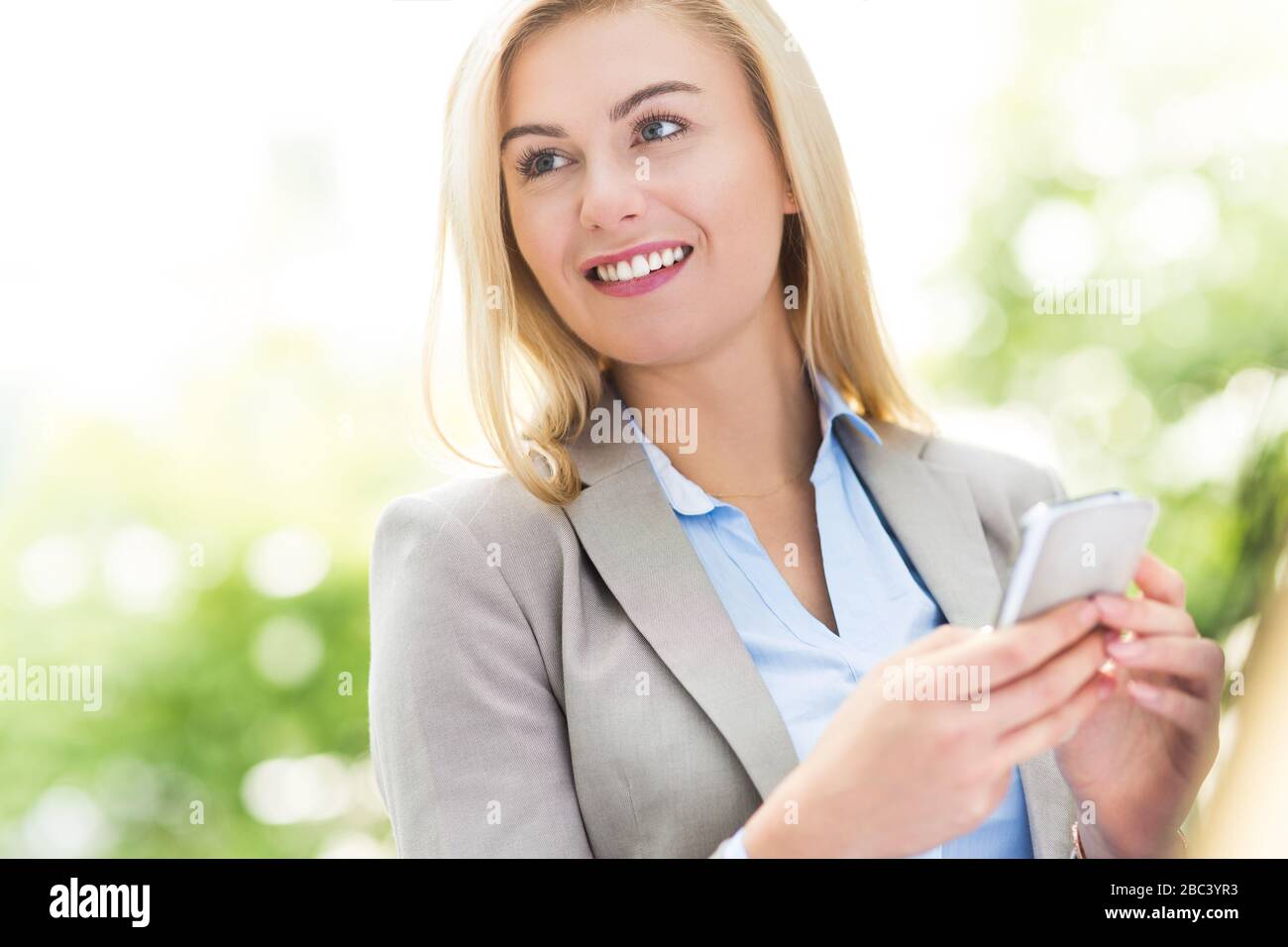 Responding text attractive young hi-res stock photography and images ...