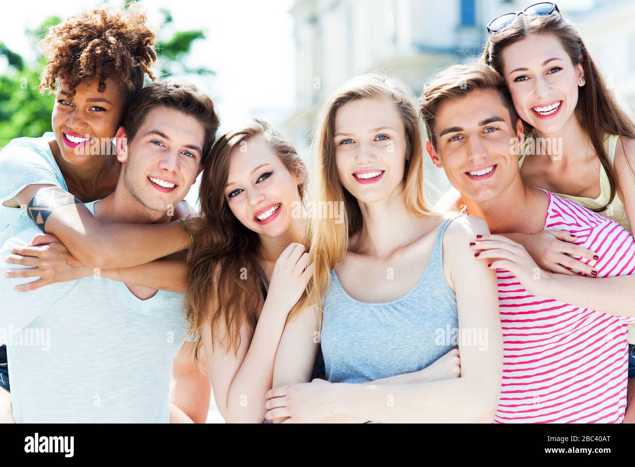 Group of friends having fun outdoors Stock Photo - Alamy