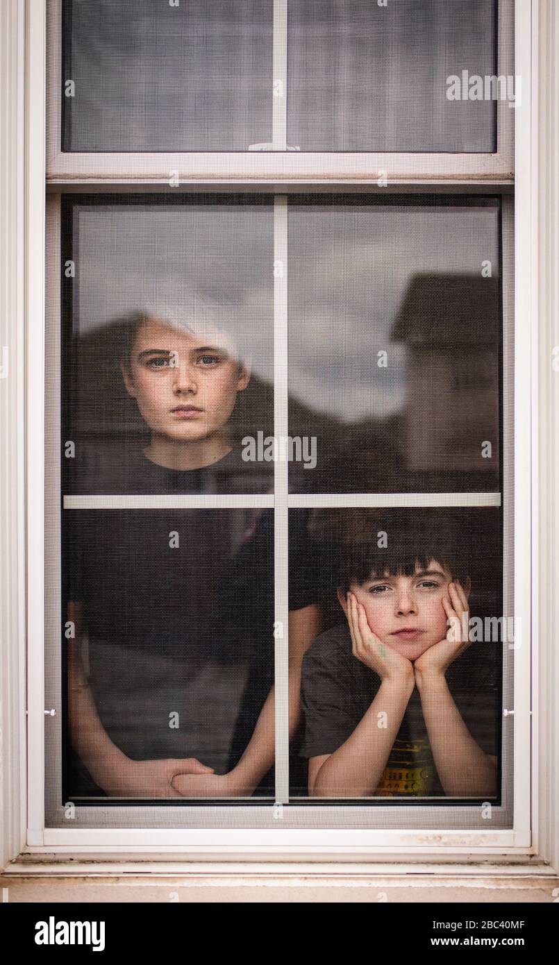 Two young boys looking hi-res stock photography and images - Alamy