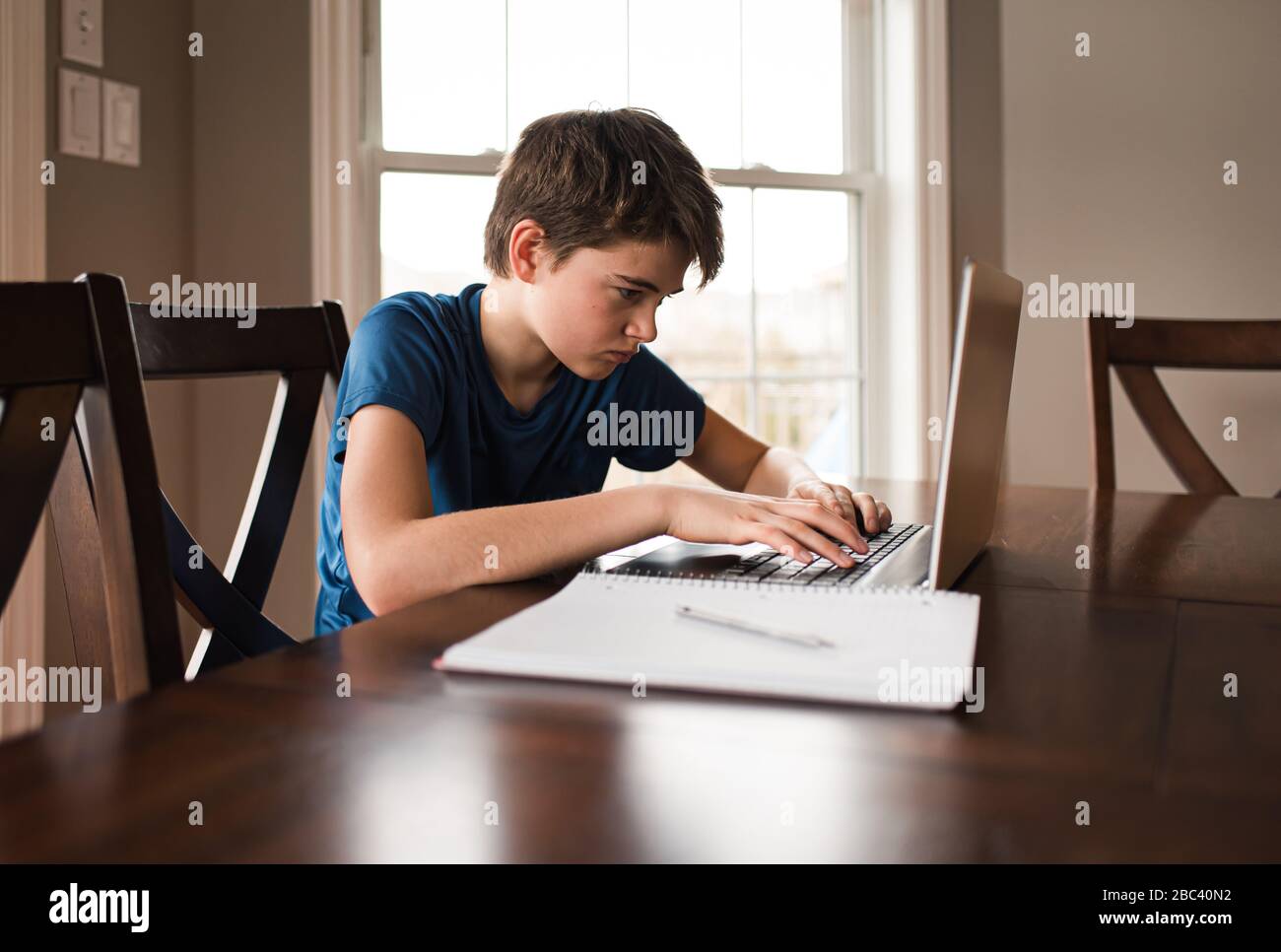 Homework laptop hi-res stock photography and images - Alamy