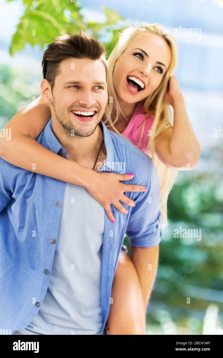 Young couple having fun outdoors Stock Photo - Alamy