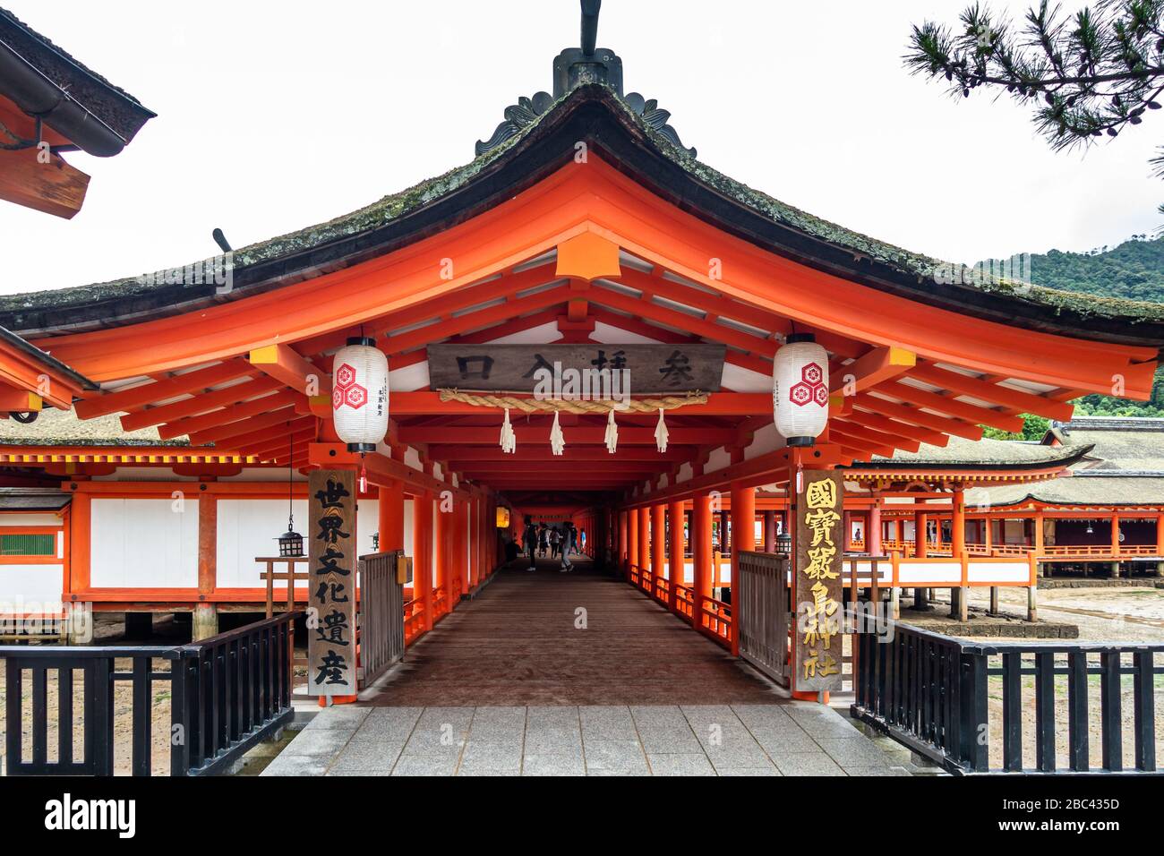 Itsukushima shrine pathway on stilts at Miyajima island, a famous ...