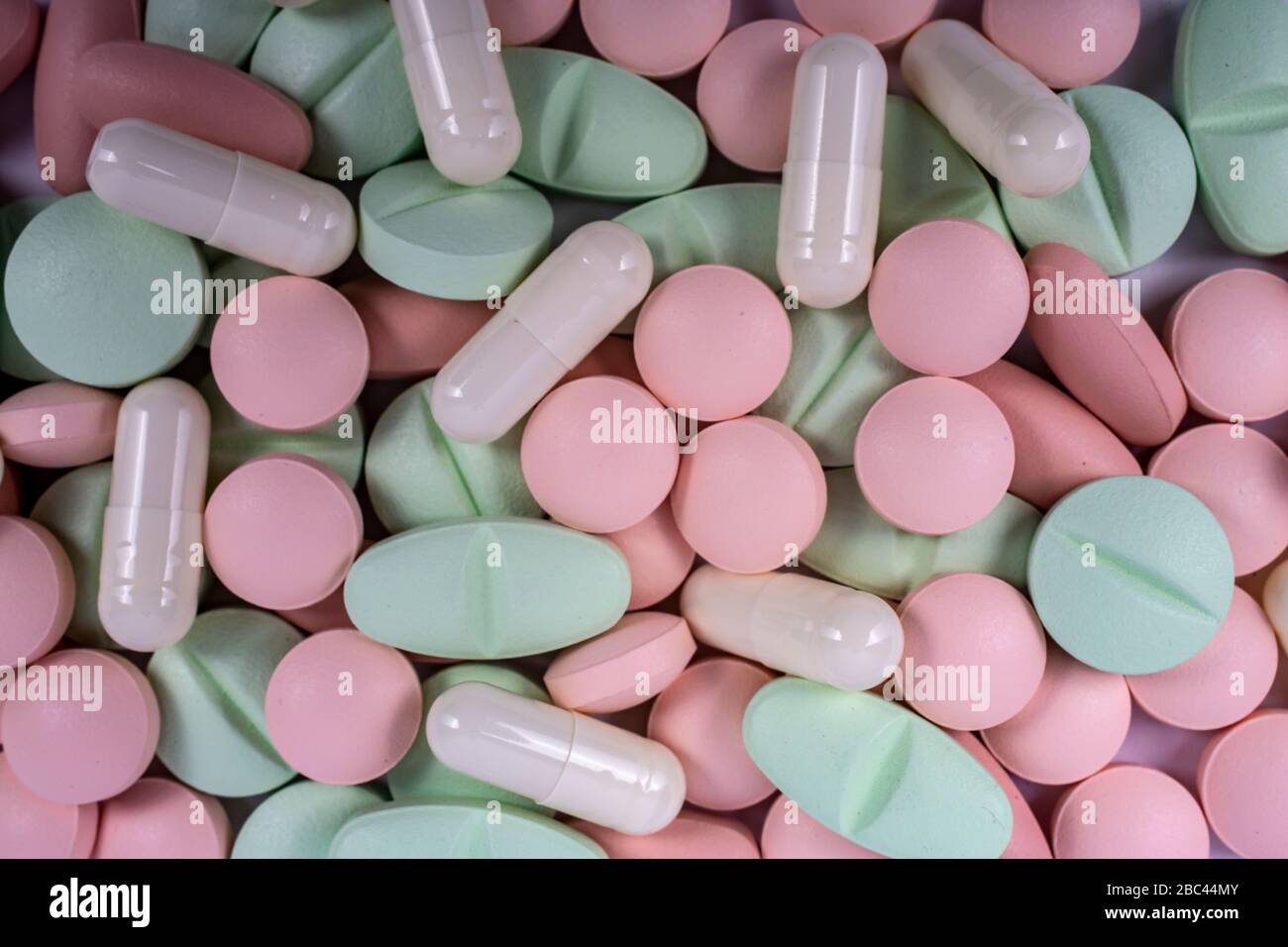 multicolored medicines closeup. Drugs, painkillers, colds and other ...