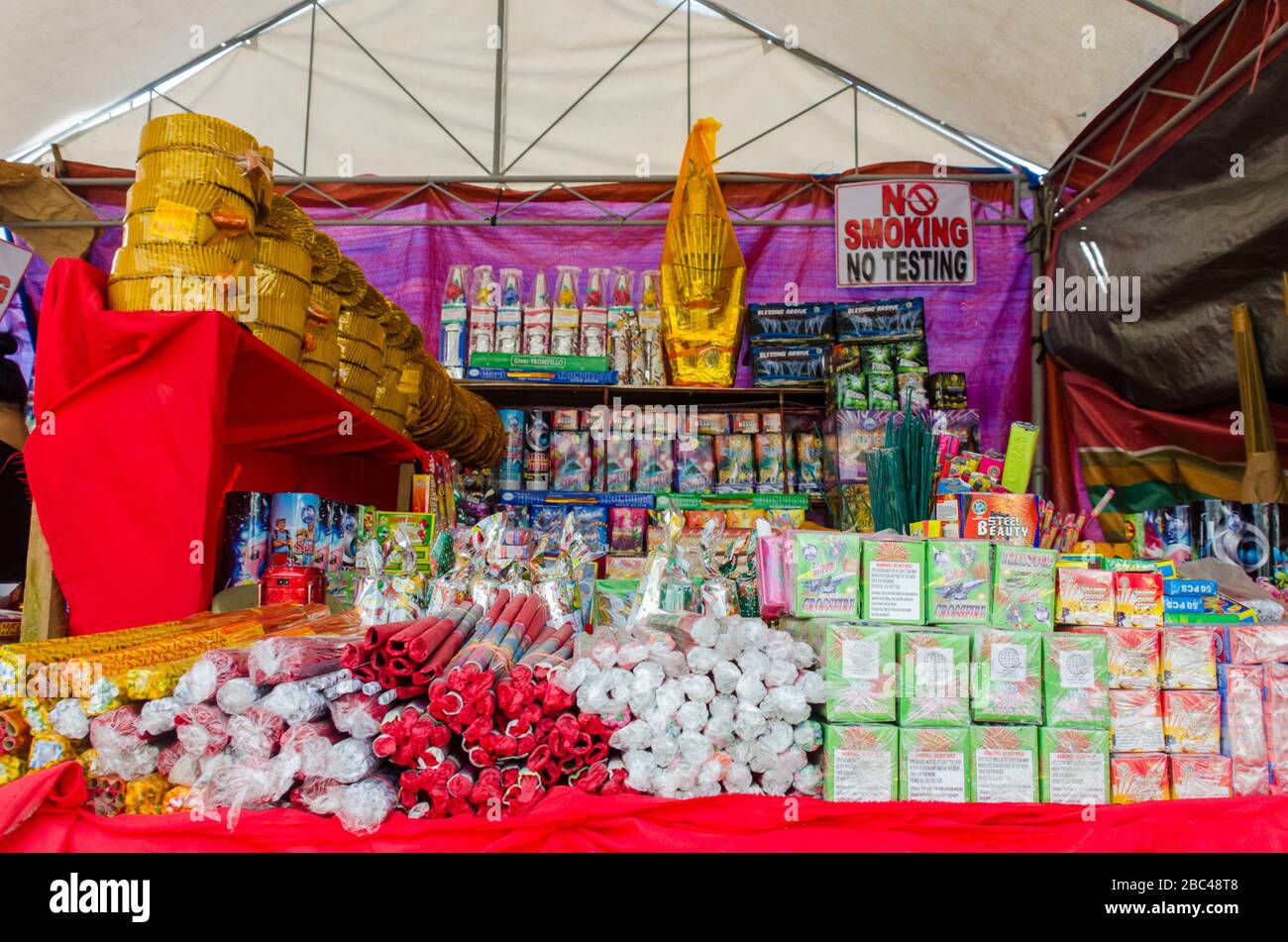 Assorted kinds of fireworks in a store shelve Stock Photo - Alamy