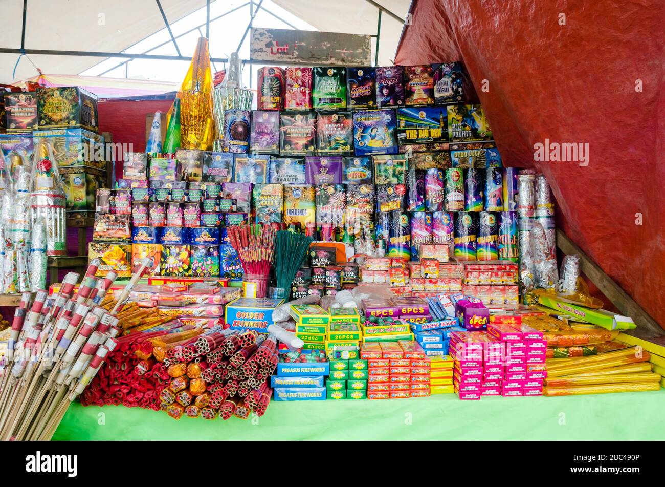 Assorted kinds of fireworks in a store shelve Stock Photo - Alamy