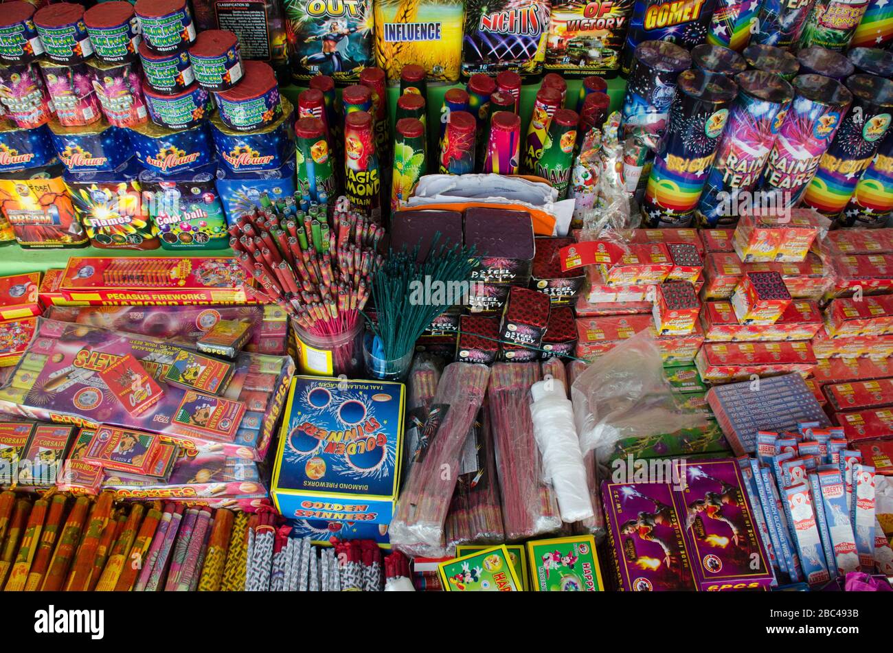 Assorted kinds of fireworks in a store shelve Stock Photo - Alamy