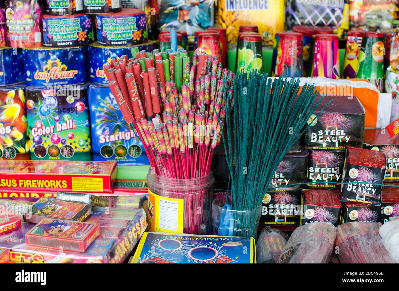 Assorted kinds of fireworks in a store shelve Stock Photo - Alamy