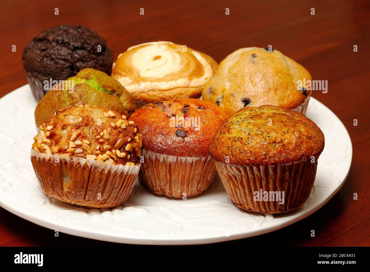 Variety of muffins, including nutty, blueberry, cream cheese, and ...