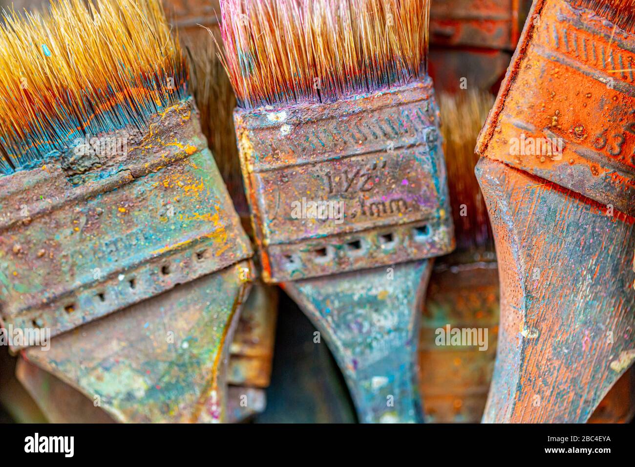 Colorful group of used artist brushes Stock Photo - Alamy